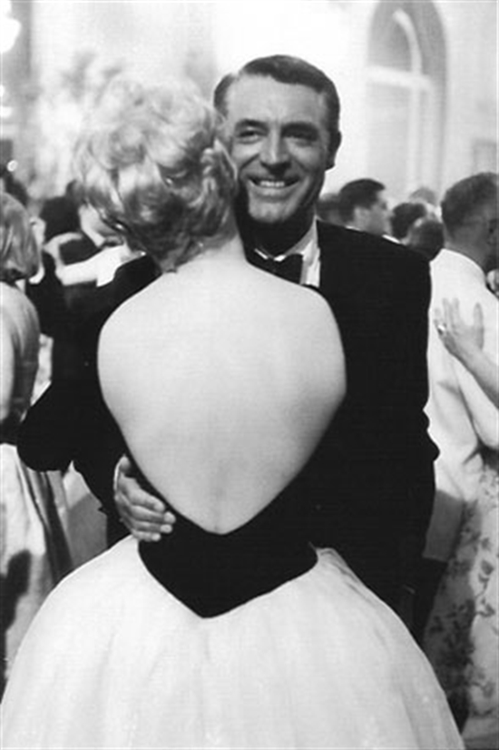 Kim Novak And Cary Grant Flirting At The Restaurant Des Ambassadeurs